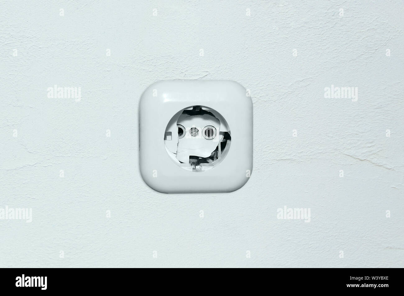 Broken electricity socket hi-res stock photography and images - Alamy