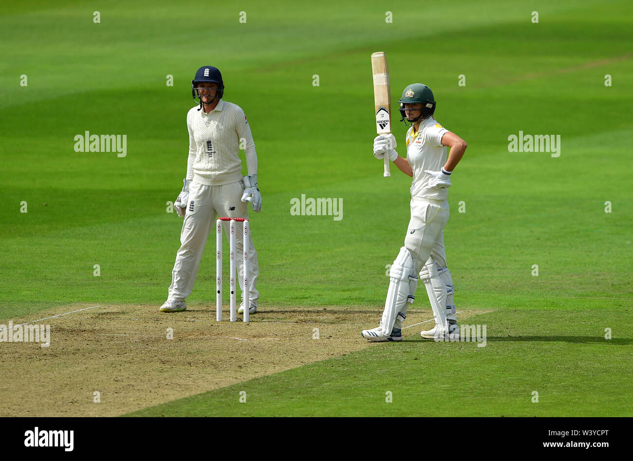 Australia's Alyssa Perry celebrates her 50 during day one of the Women ...