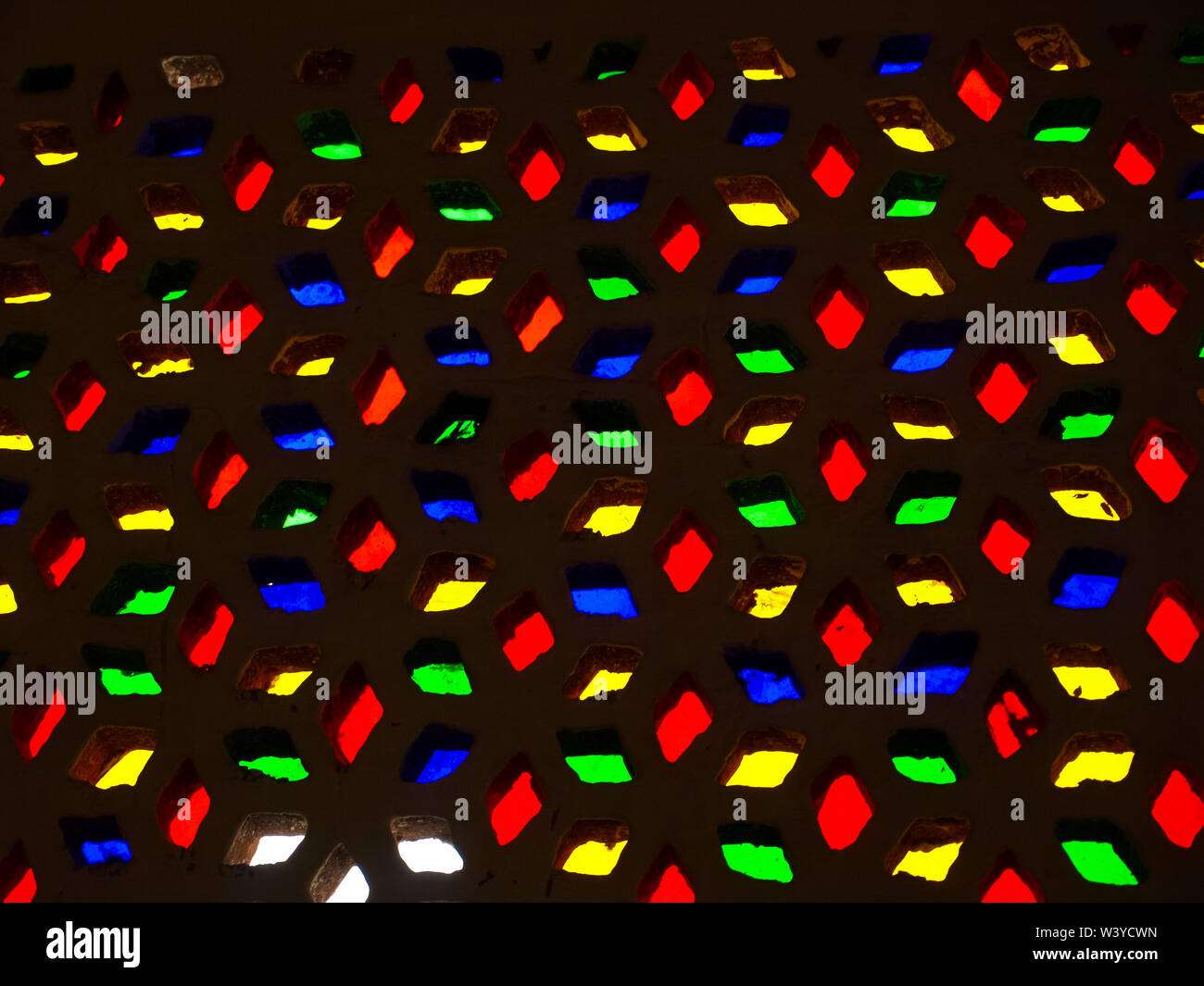 Colorful patterns of light window in India Stock Photo - Alamy