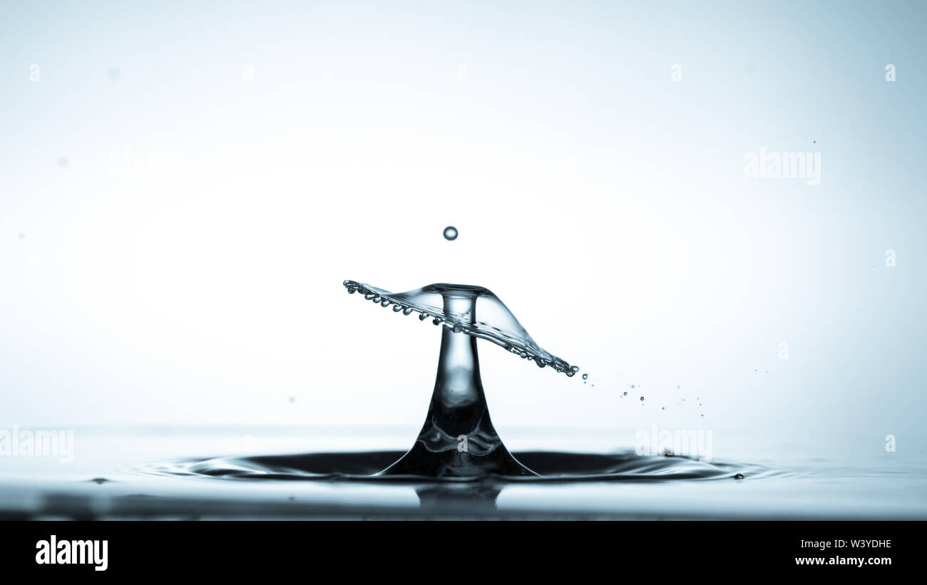 Macro shot of a water drop collision. abstract water splash Stock Photo ...