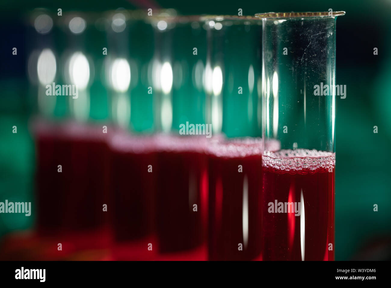 Test tube in rack and pipette media dispenser Stock Photo - Alamy