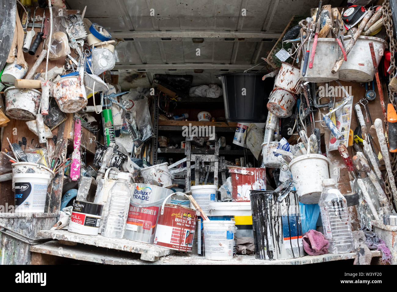 Interior of a home decorator's van photographed from the rear, full of ...