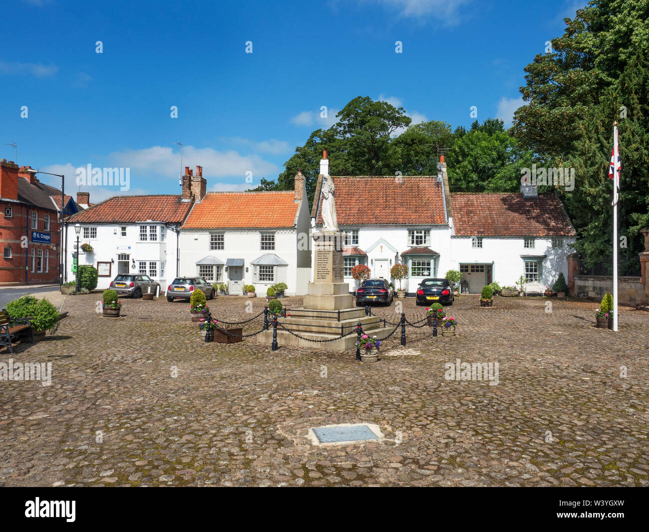 War memorial and cottages in Hall Square at Boroughbridge North ...