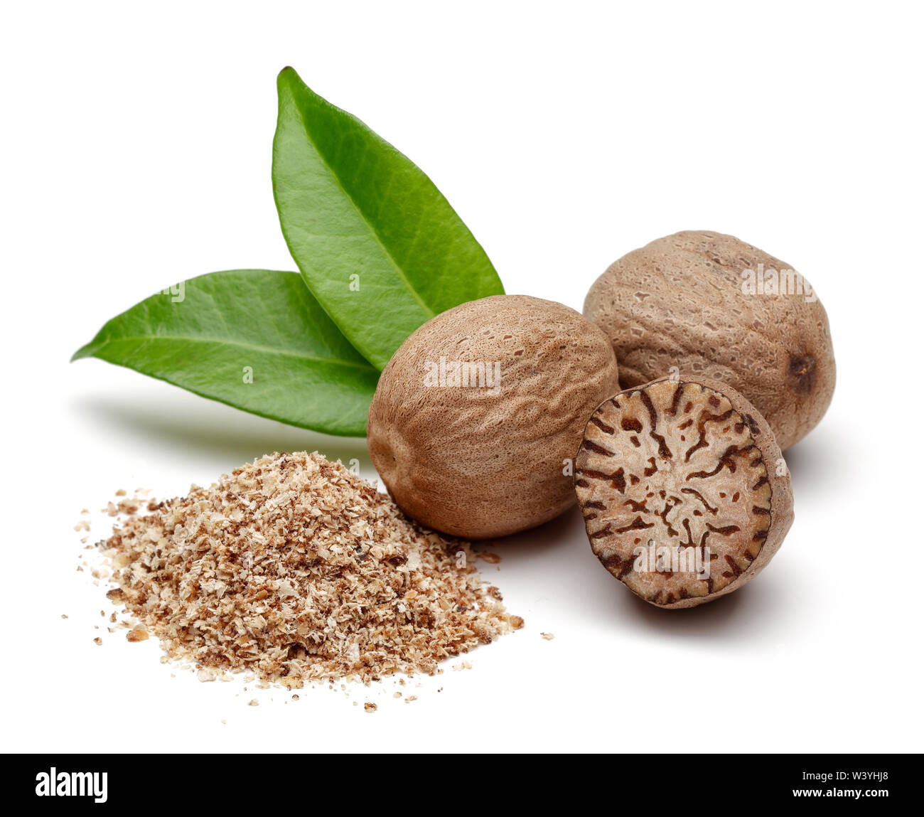 Whole and grated nutmeg with leaves isolated on white background Stock ...