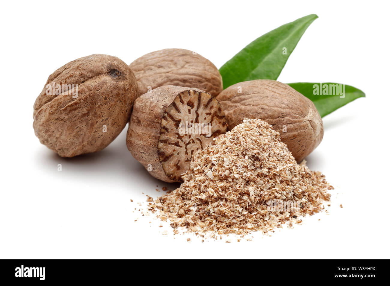 Whole and grated nutmeg with leaves isolated on white background Stock ...