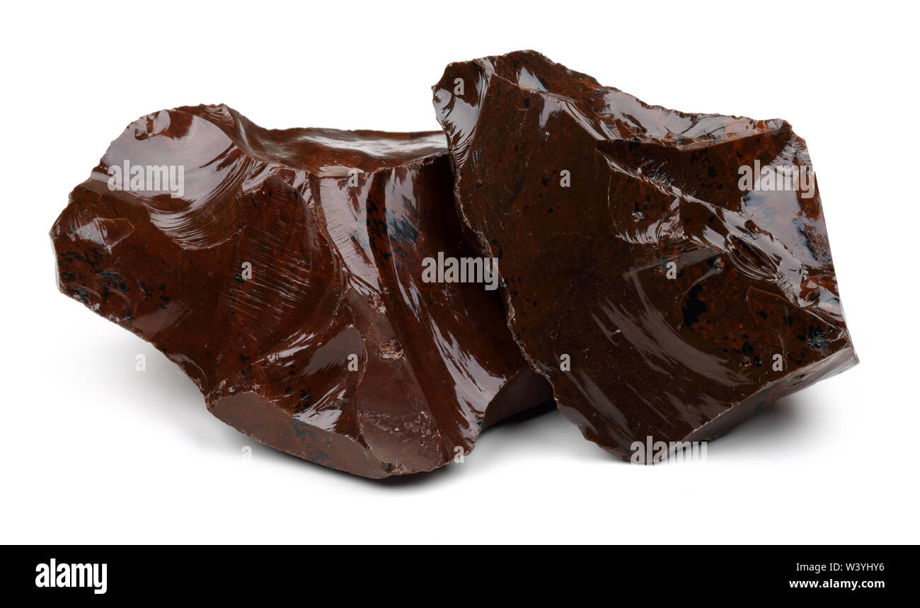 Brown obsidian pieces isolated on white background Stock Photo - Alamy