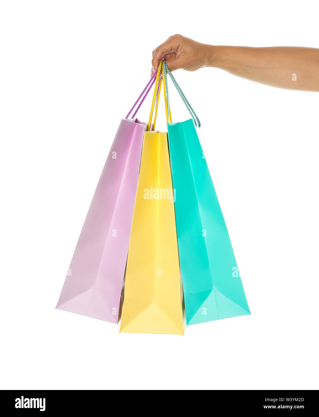 Female hand hold color paper bags isolated on white background Stock ...