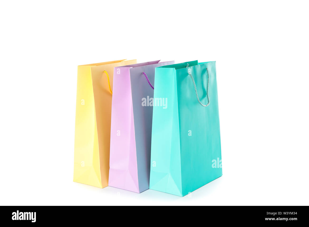 Color paper bags isolated on white background Stock Photo - Alamy