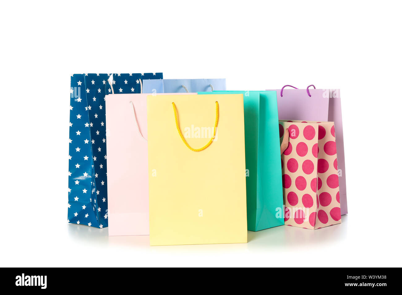 Multicolor paper bags isolated on white background Stock Photo - Alamy