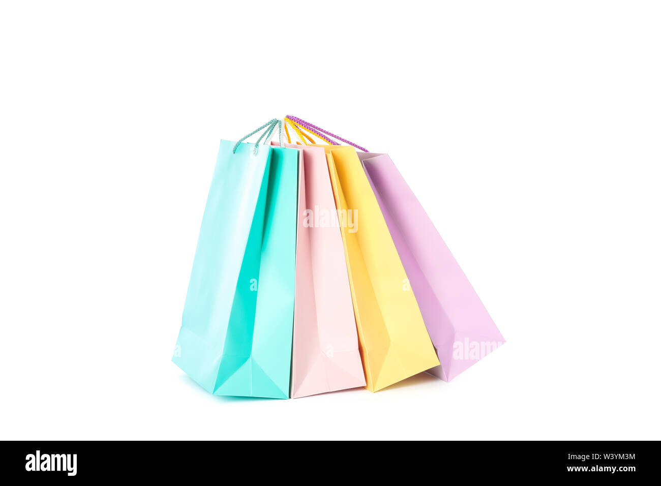 Multicolor paper bags isolated on white background Stock Photo - Alamy