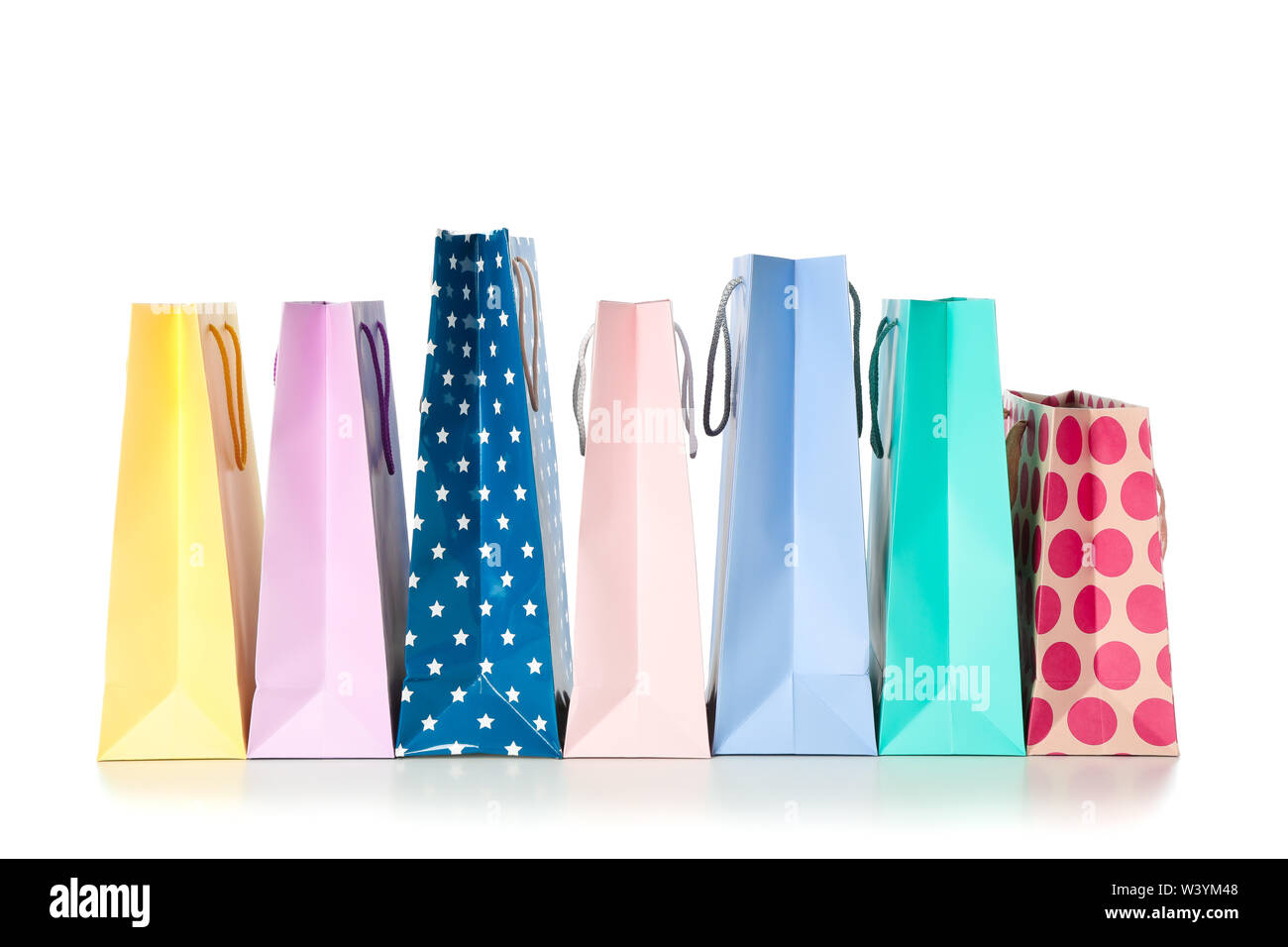 Multicolor paper bags isolated on white background Stock Photo - Alamy