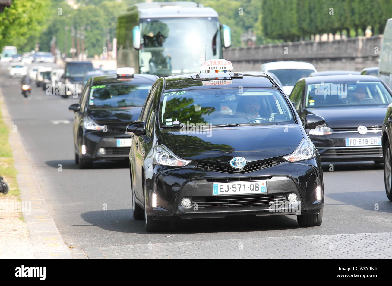 Taxi drive through downtown Paris France Stock Photo - Alamy