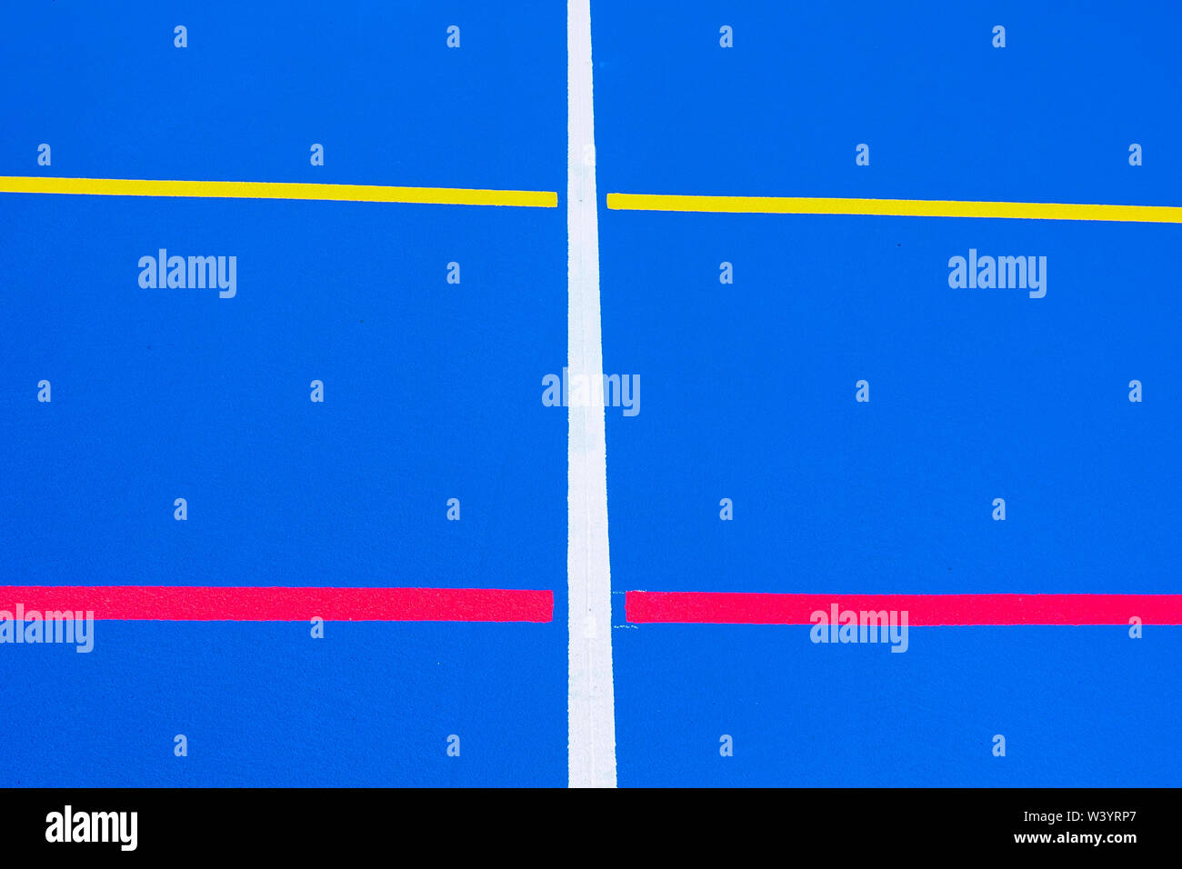 Design of a sports field, with blue background and red and yellow white ...