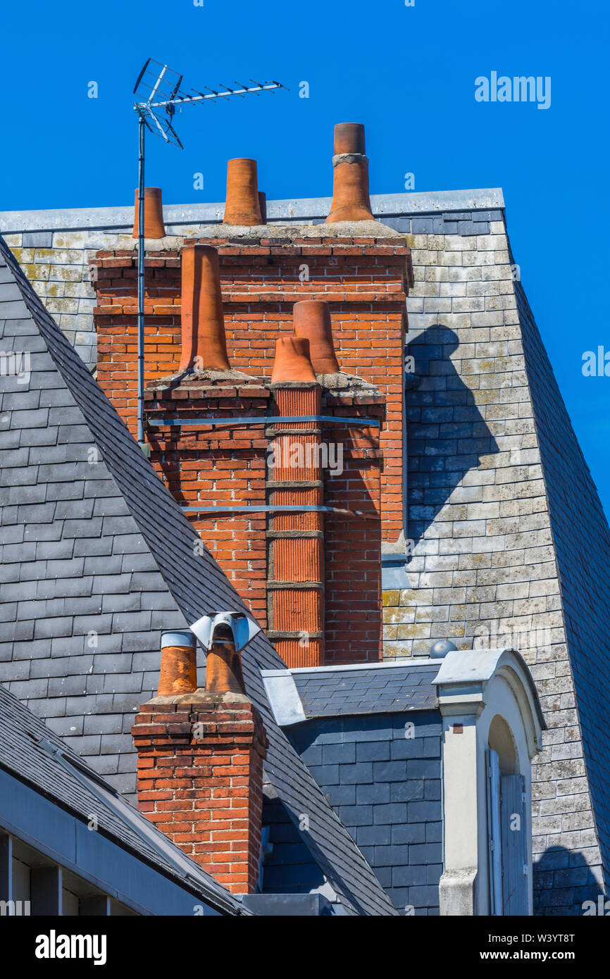 Brick chimney stacks on old buildings, Tours, France Stock Photo - Alamy
