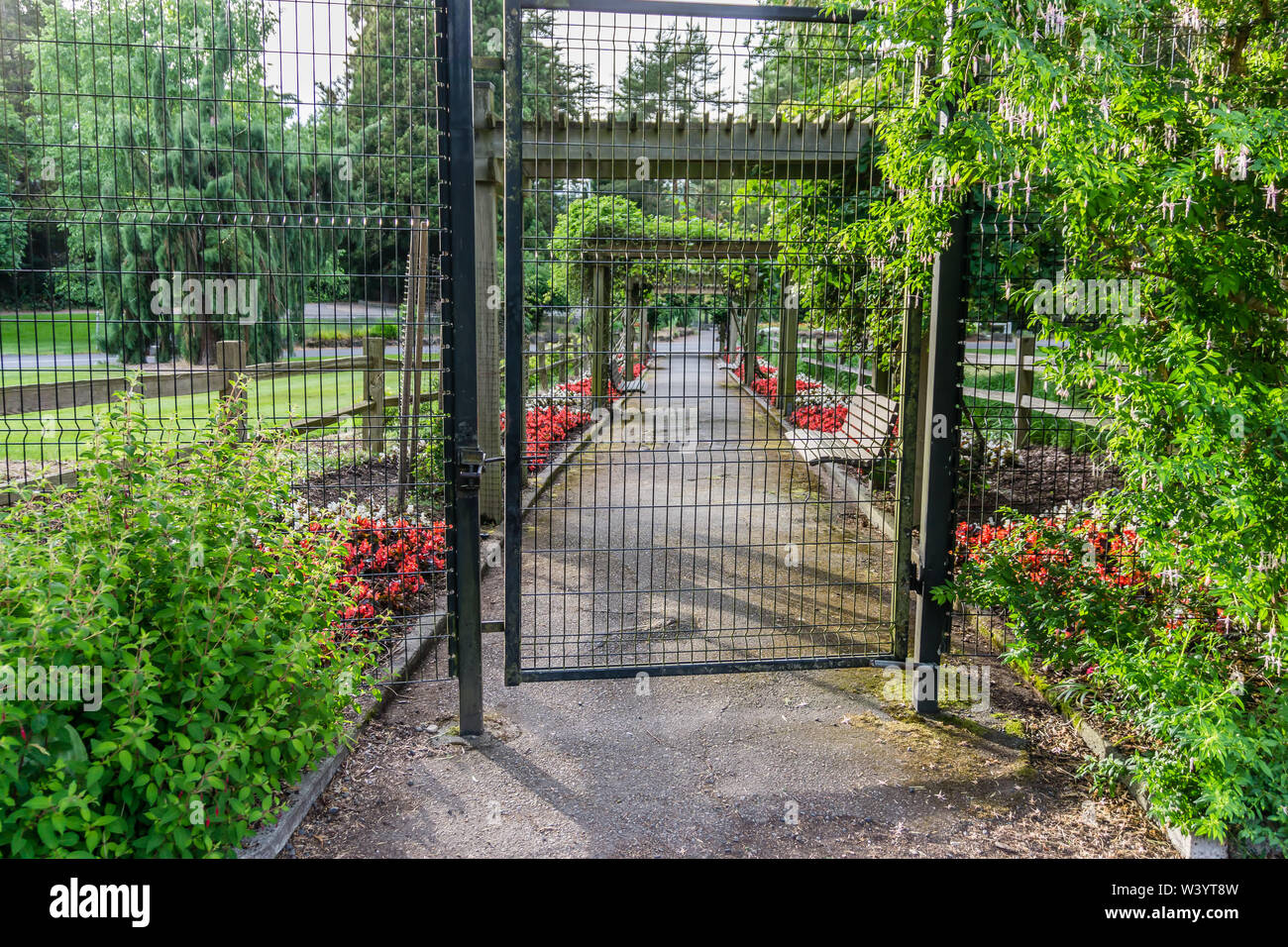 A view of a gate and walkway at the rose garden in Point Defiance Park ...