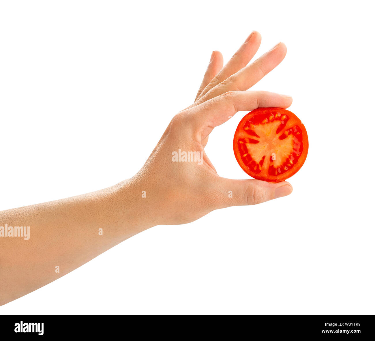 sliced tomato in hand path isolated on white Stock Photo - Alamy