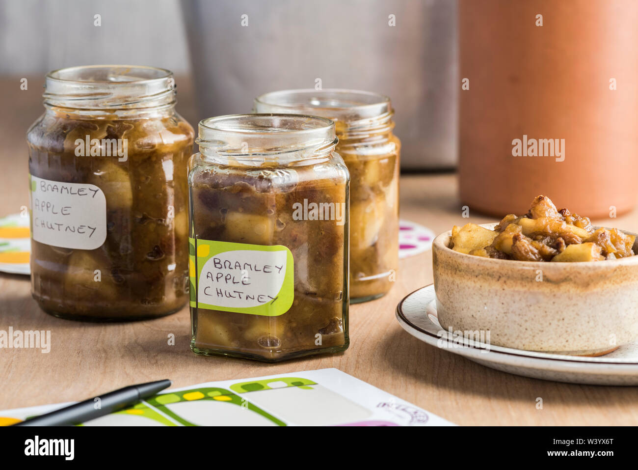 Bramley apple and sultana chutney, hand written labels on jars Stock ...
