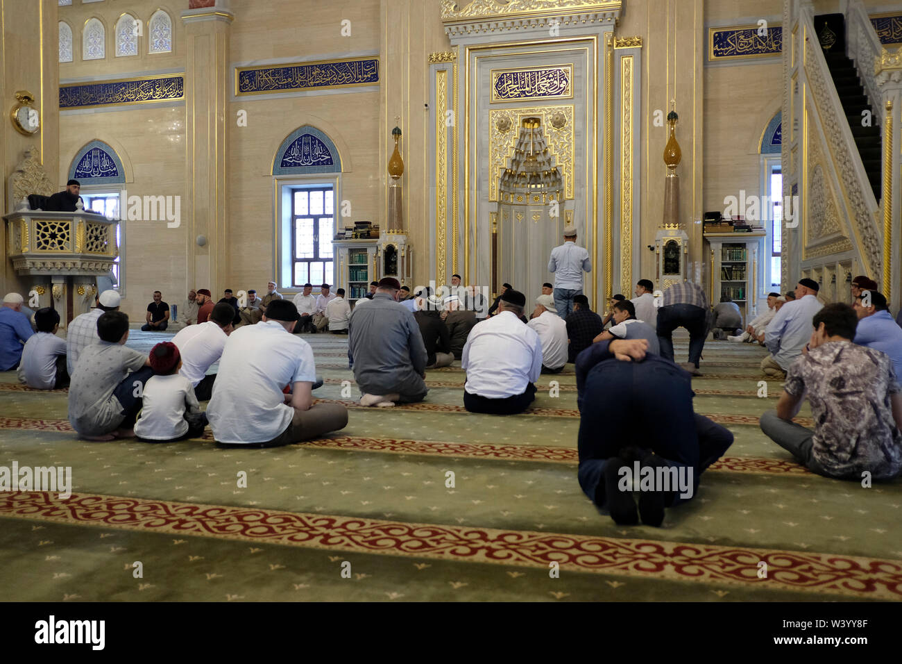 Muslim worshipers pray inside Akhmad Kadyrov Mosque in Grozny the ...