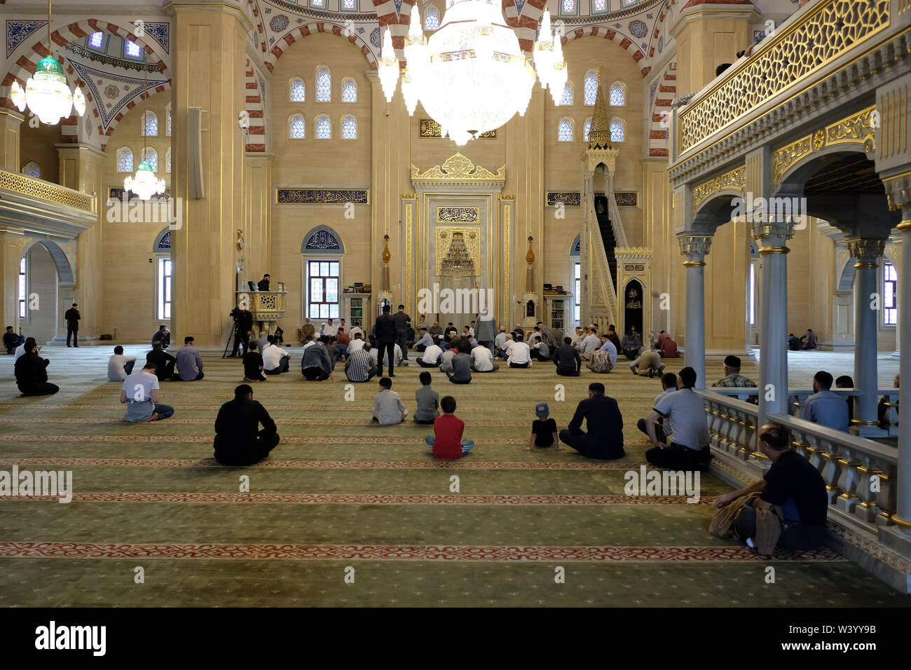 Muslim worshipers pray inside Akhmad Kadyrov Mosque in Grozny the ...