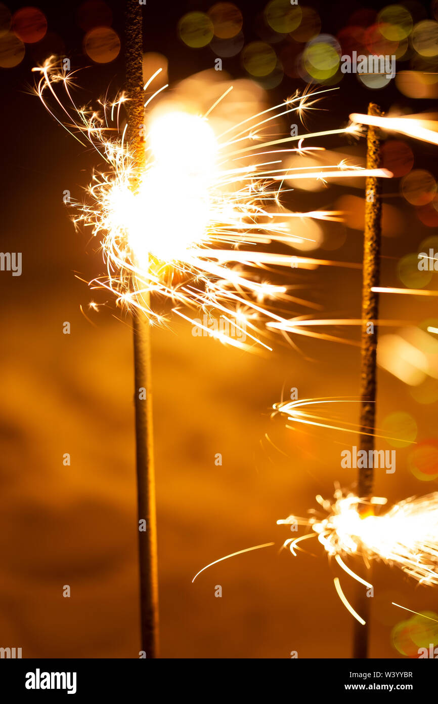 Burning Bengal New Year's fire on a black background Vertical Stock ...