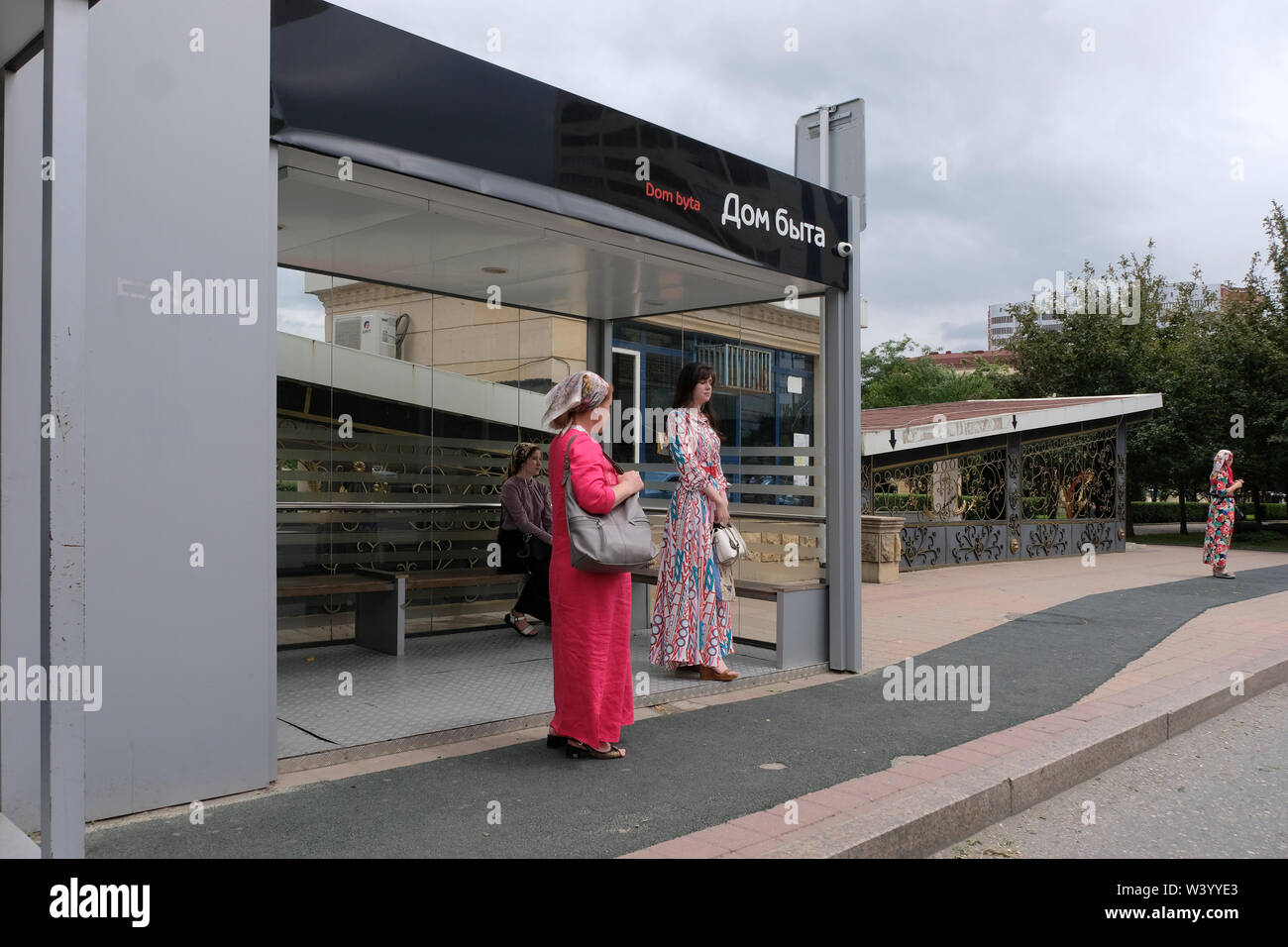 Women waiting for a bus in Grozny the capital city of Chechnya ...