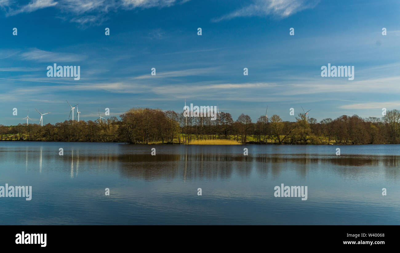 lake with wind mills Stock Photo - Alamy