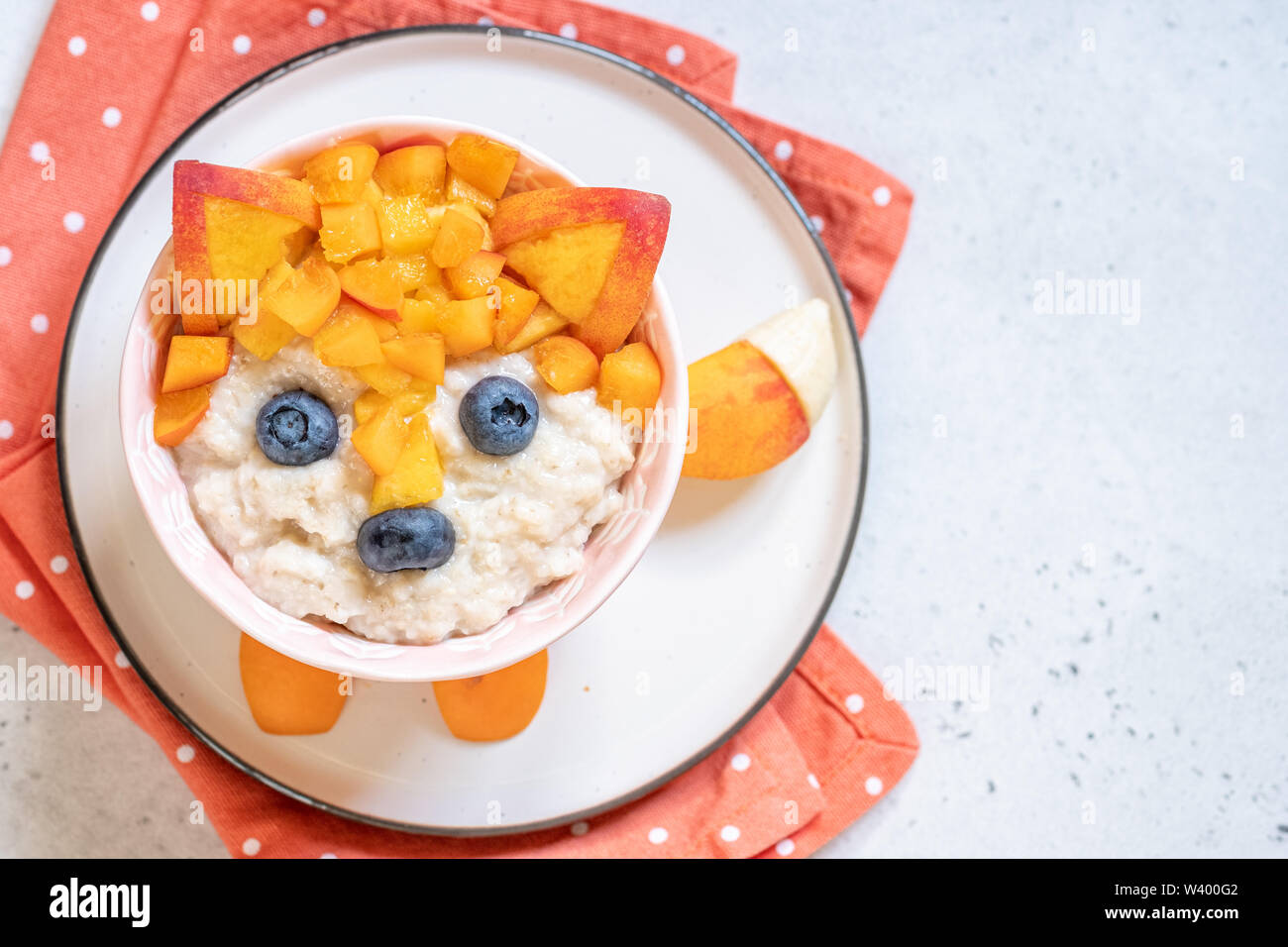Funny Breakfast For Kids Oatmeal Porridge Stock Photo - Alamy