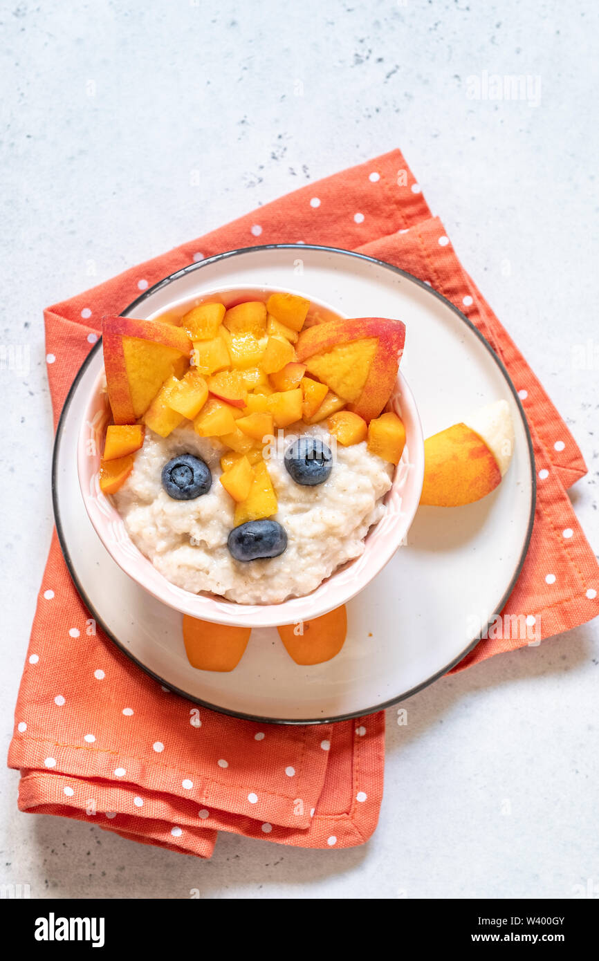 Funny Breakfast For Kids Oatmeal Porridge Stock Photo - Alamy