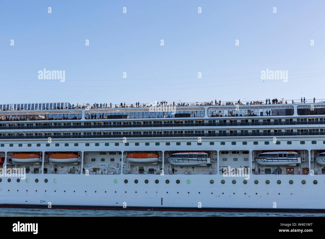 Close up of a cross section of one of many cruise ships arriving at ...