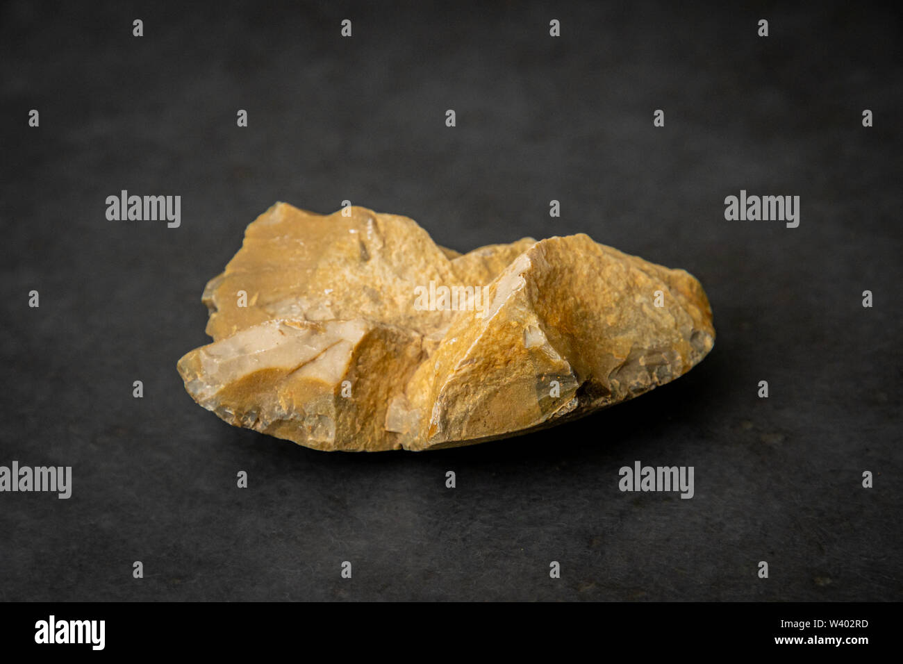 Piece of broken apart gravel stone sharp edged Stock Photo - Alamy