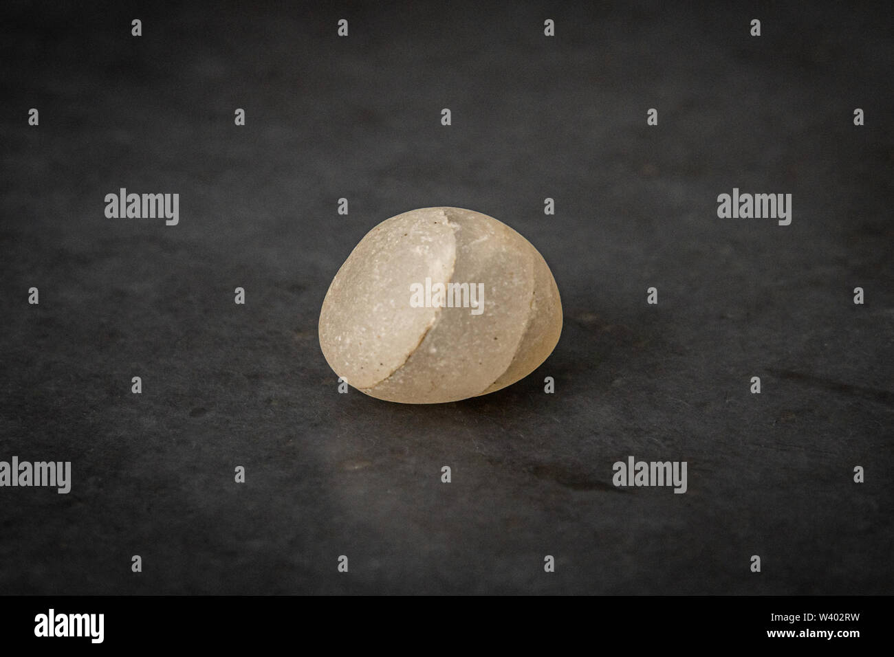 Round small gravel of sandstone washed round by the waves of the sea ...