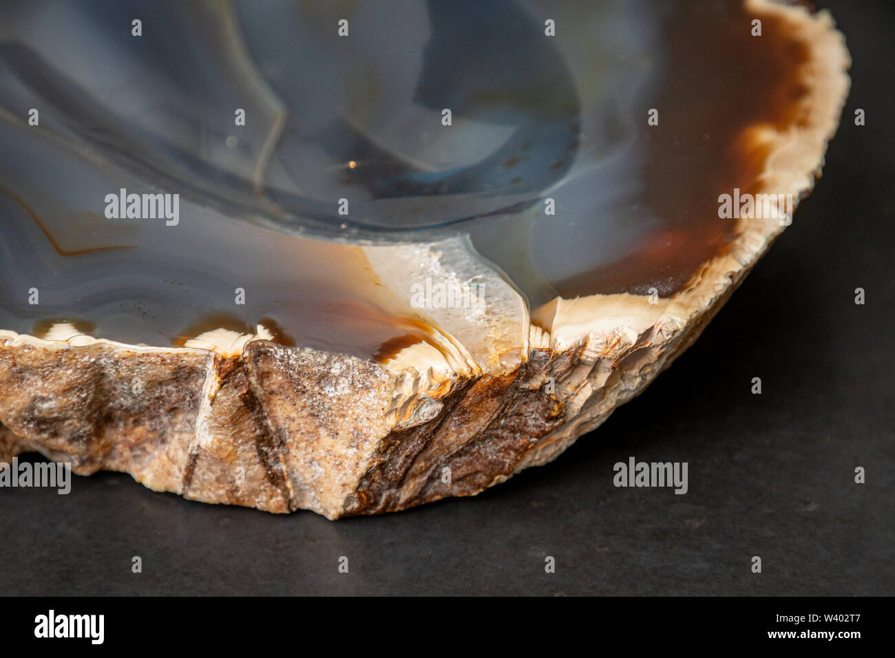 Slice of Geode blue colorful gemstone looking like normal rock from ...