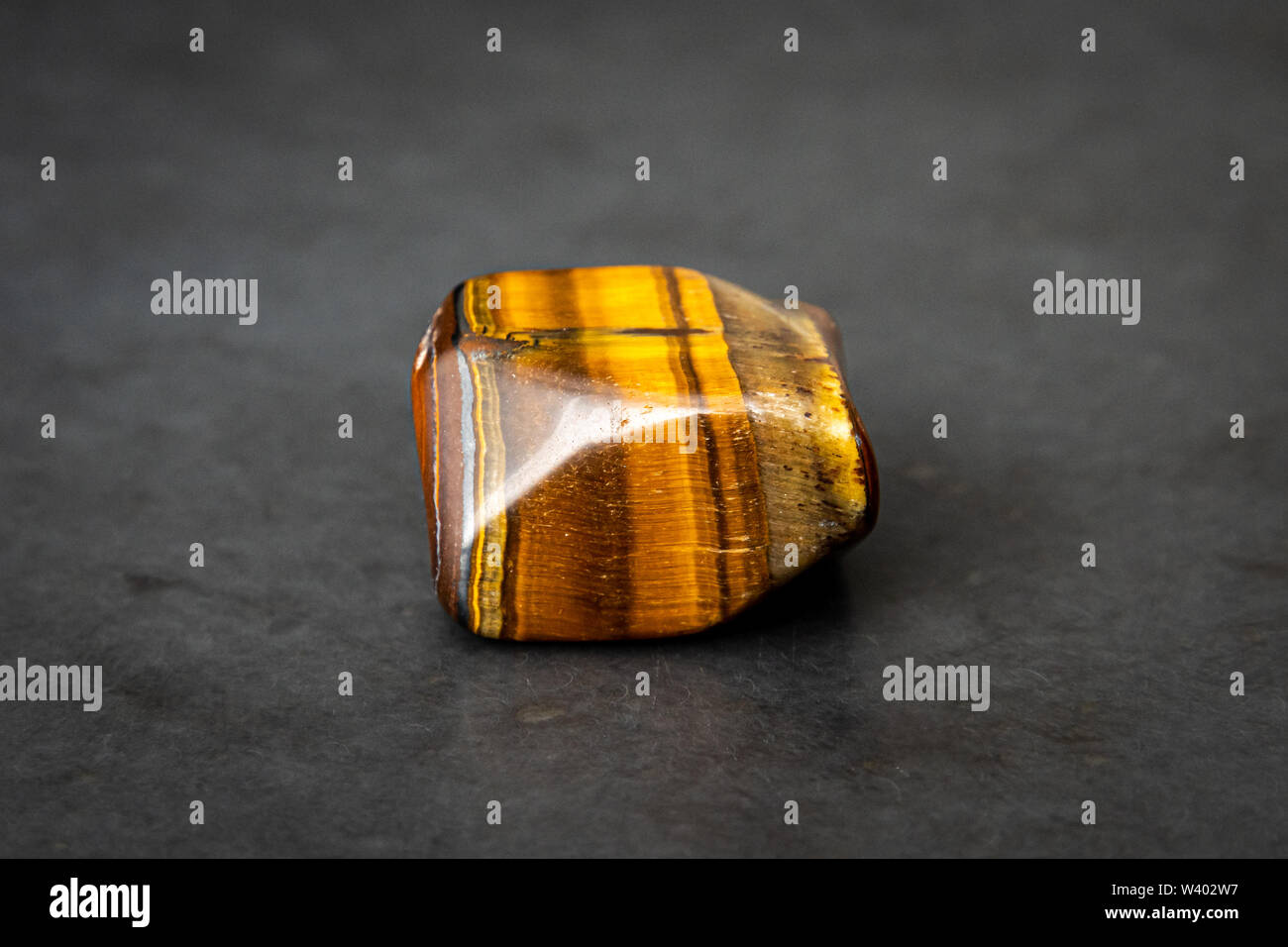 Tiger eye gemstone beautiful gemstone shining in yellow and brown Stock ...