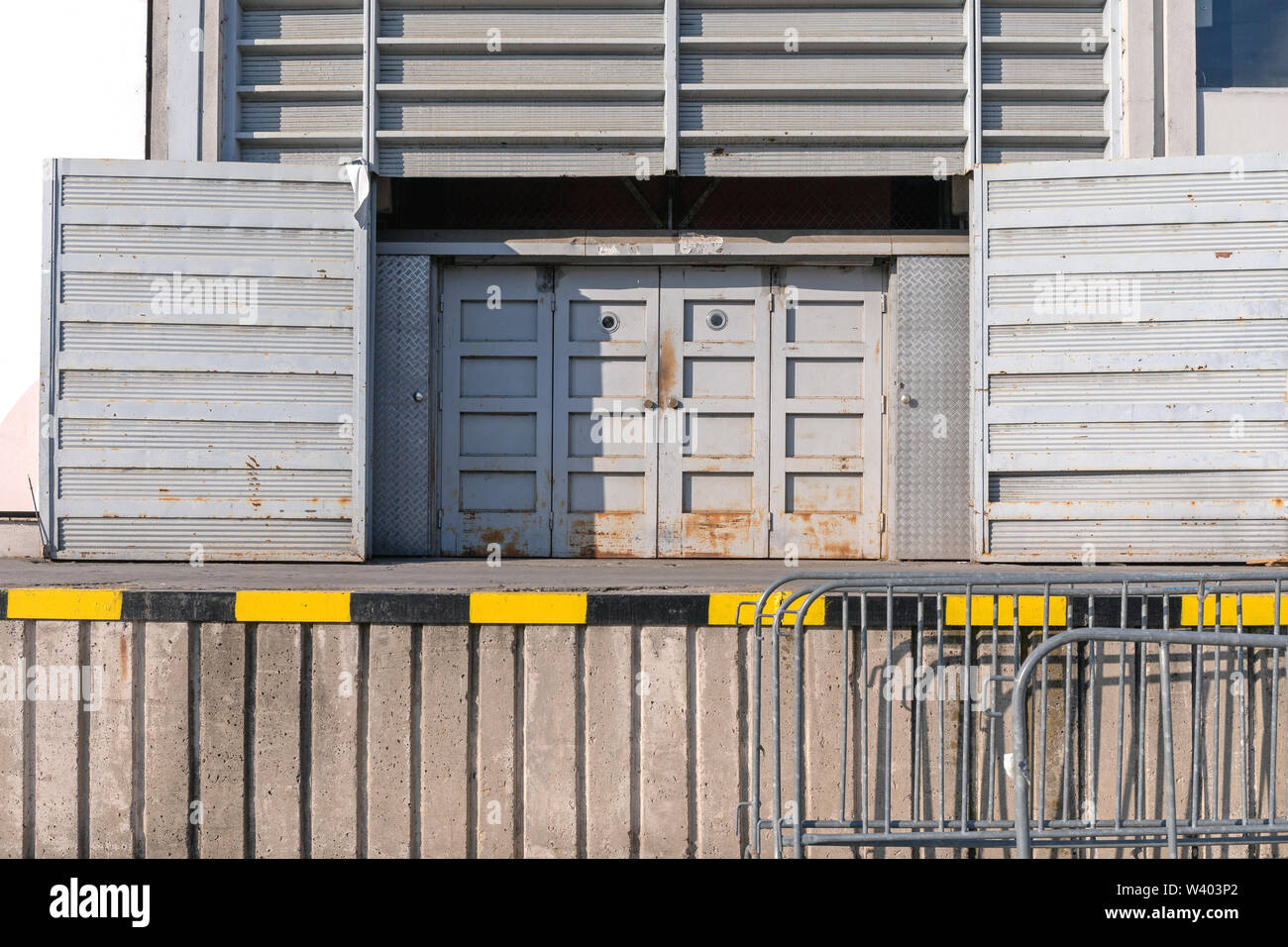 Big Doors and Warehouse Loading Dock Stock Photo - Alamy