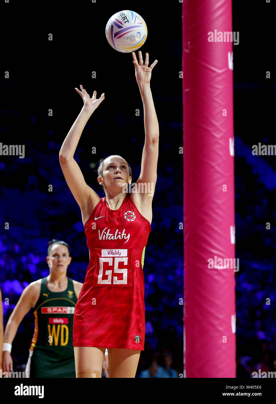England's Joanne Harten shoots towards the net during the netball World ...