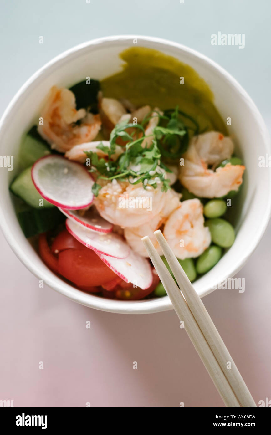 Healthy Poke Bowl with fresh ingredients Stock Photo - Alamy