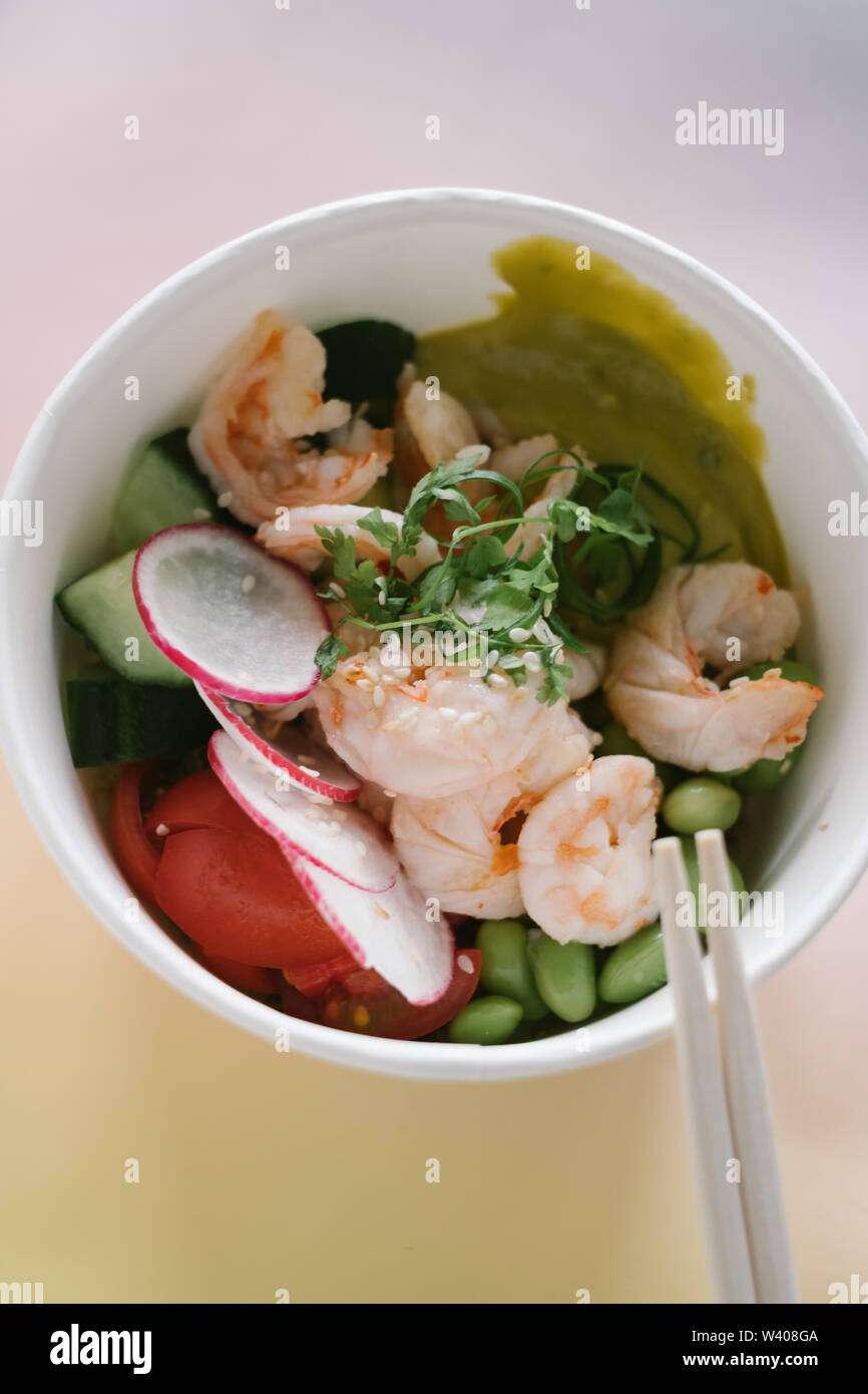 Healthy Poke Bowl with fresh ingredients Stock Photo - Alamy