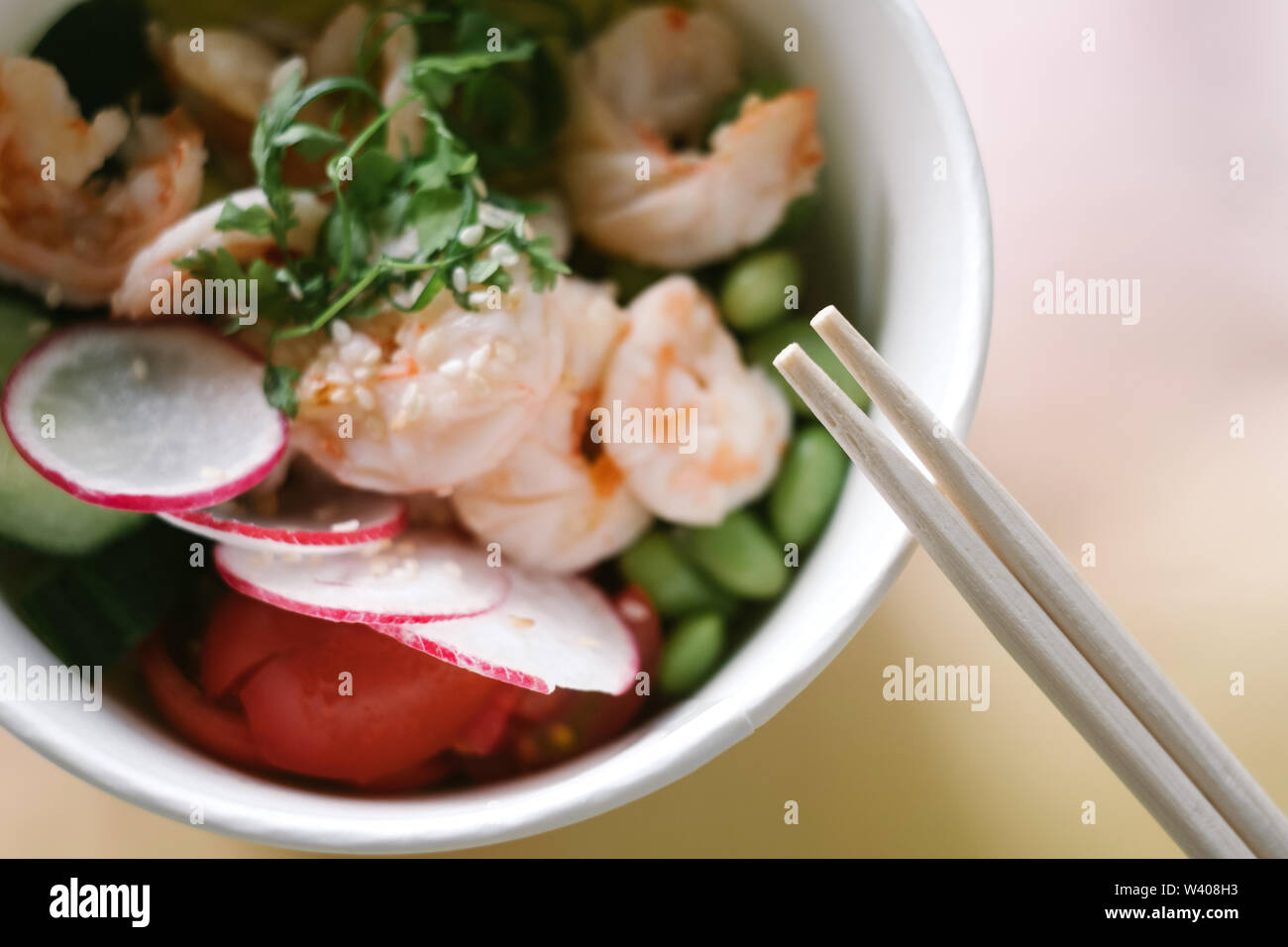 Healthy Poke Bowl with fresh ingredients Stock Photo - Alamy