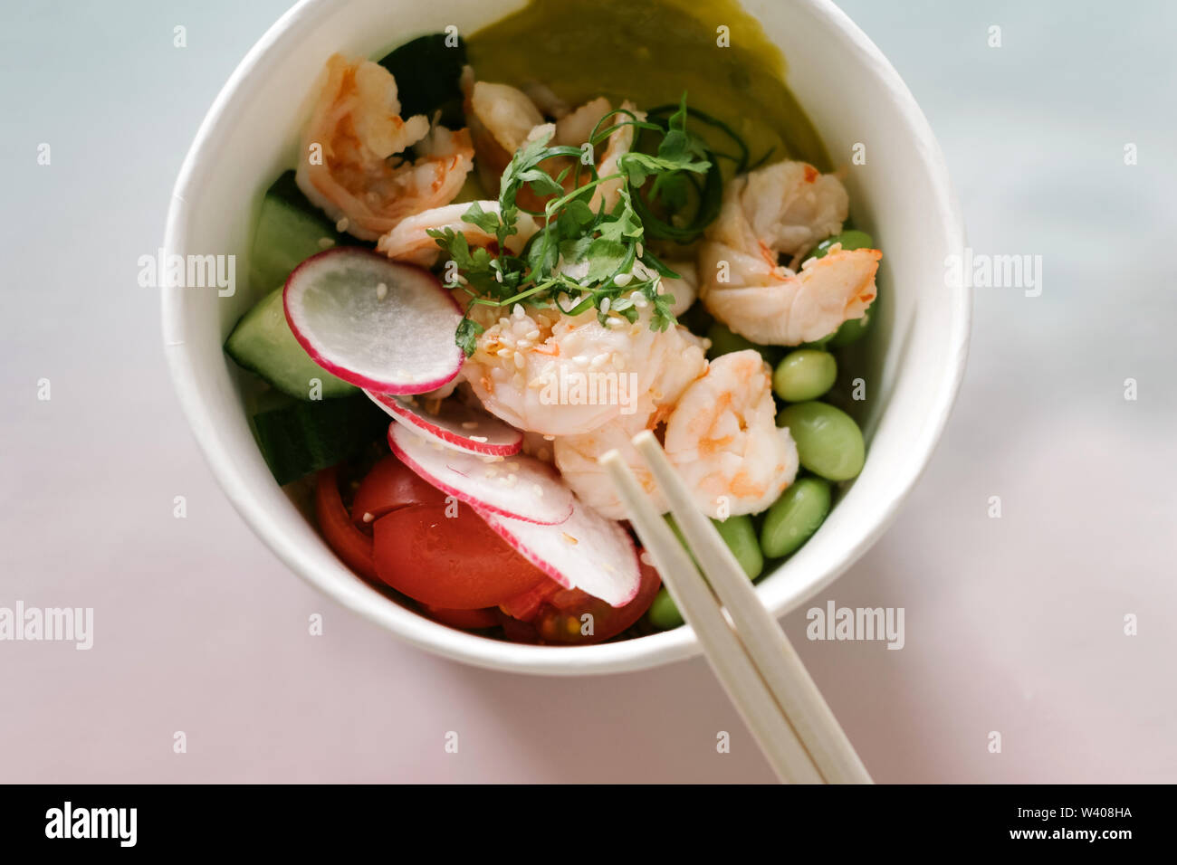 Healthy Poke Bowl with fresh ingredients Stock Photo - Alamy