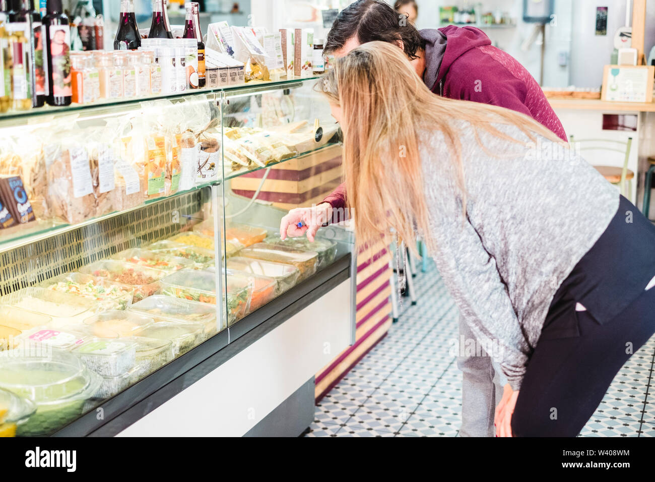 Choosing food in a vegetarian restaurant Stock Photo - Alamy