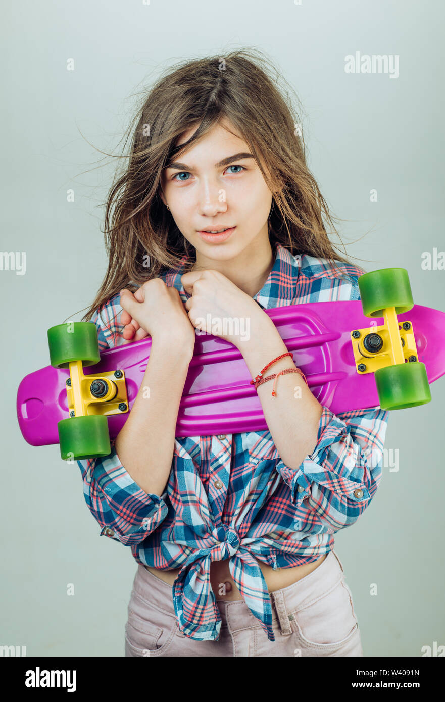 plastic mini cruiser board. Spring. Urban scene, city life. skateboard ...