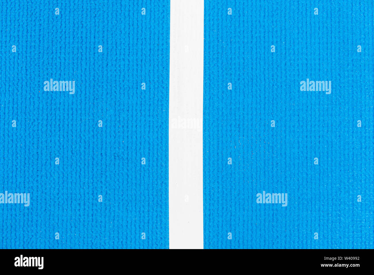 Blue running track synthetic rubber on the athletic stadium Stock Photo ...