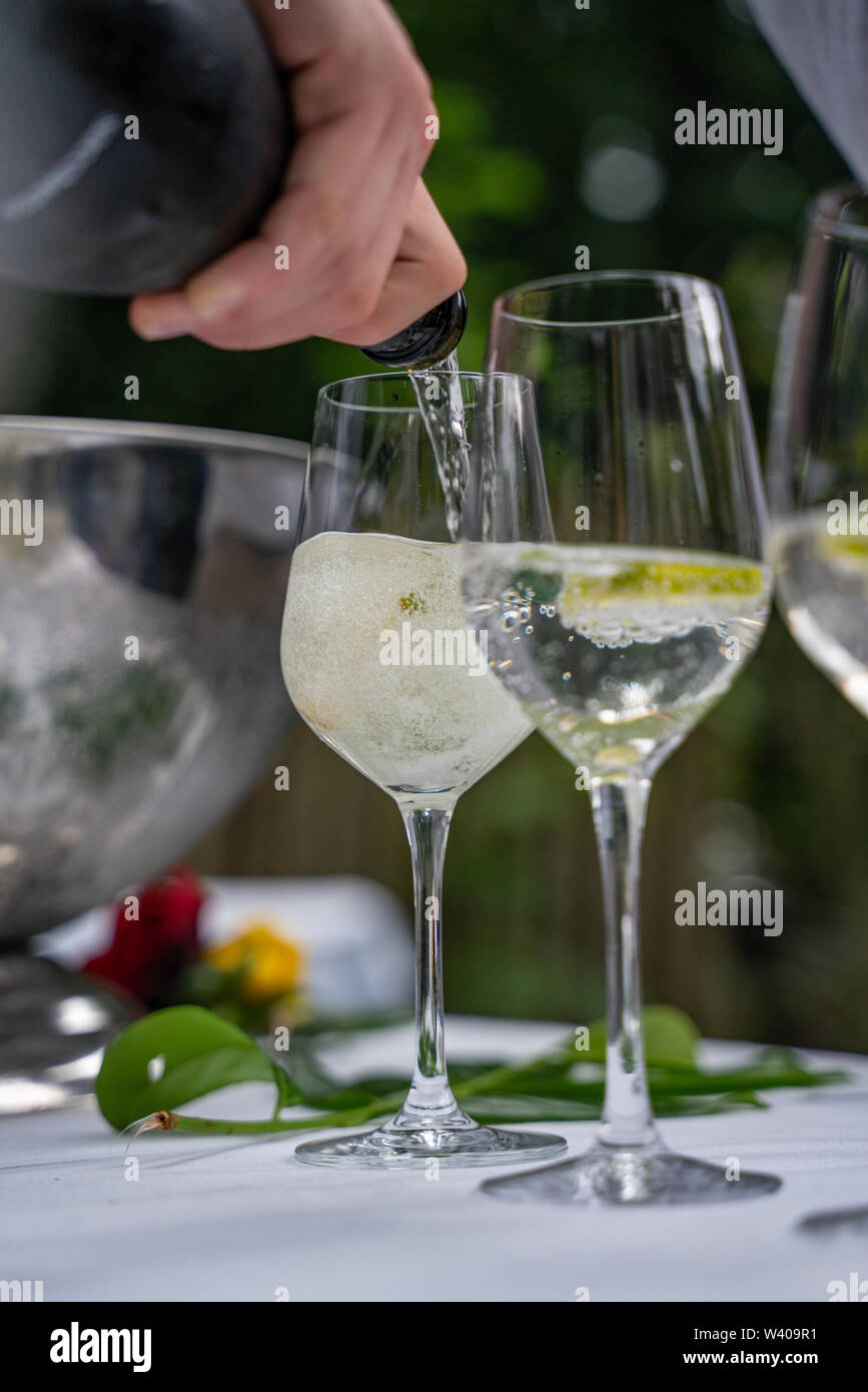Close up of pouring in aperitif at an outdoor bar Stock Photo - Alamy