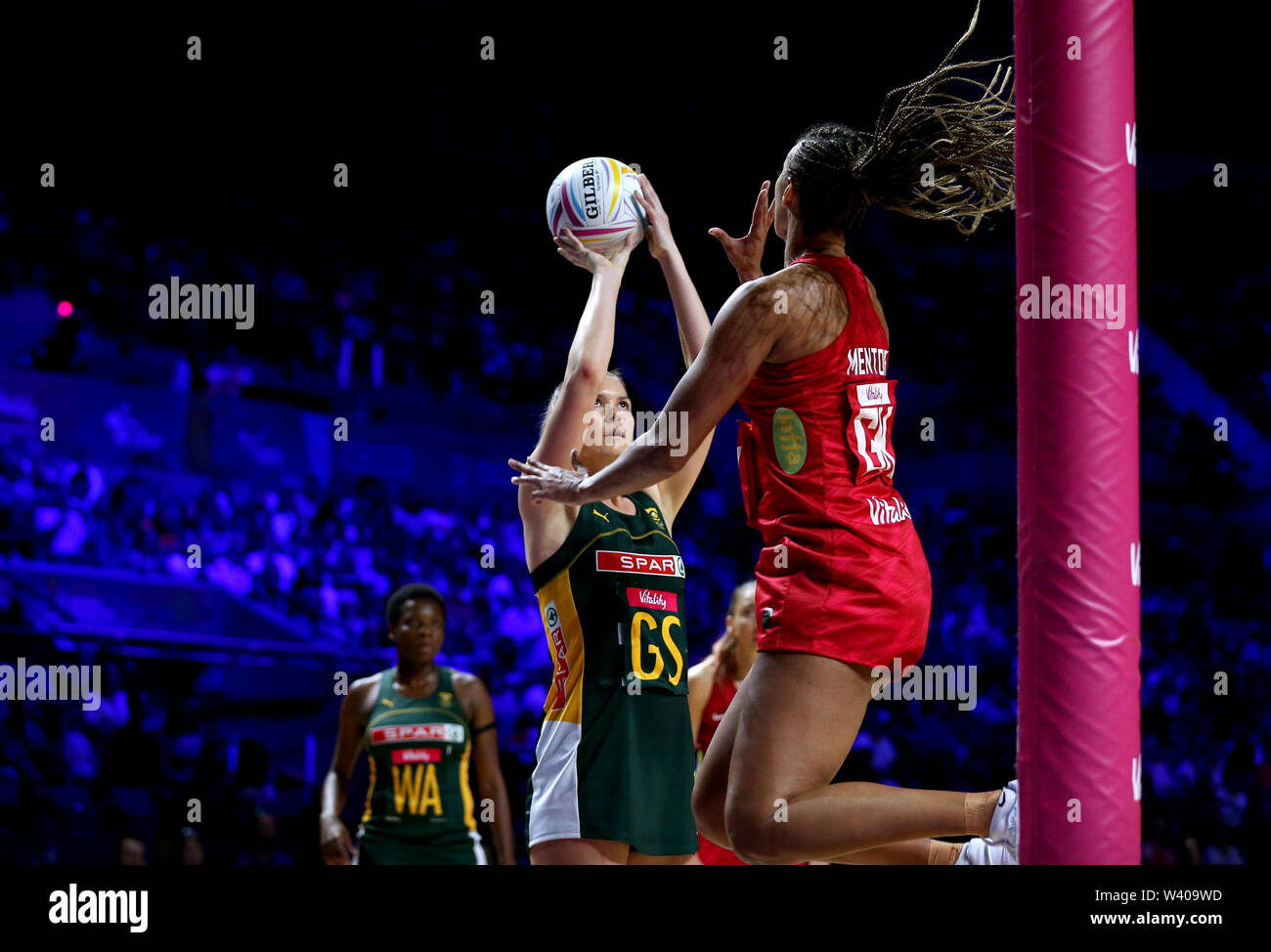 South Africa's Lenize Potgieter shoots towards the net as England's ...