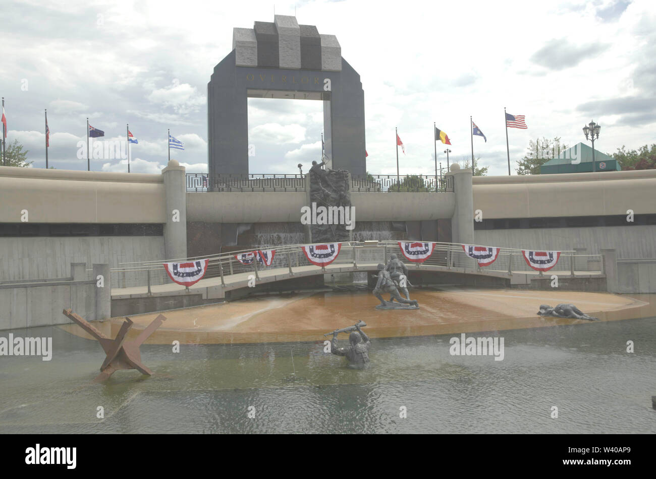 Statues of soldiers invading during D-Day are depicted at the Memorial ...