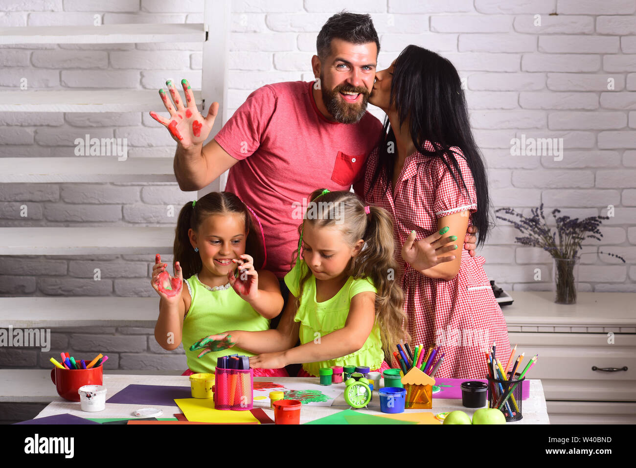 Arts and crafts. Happy childhood and parenting. Mother and father ...