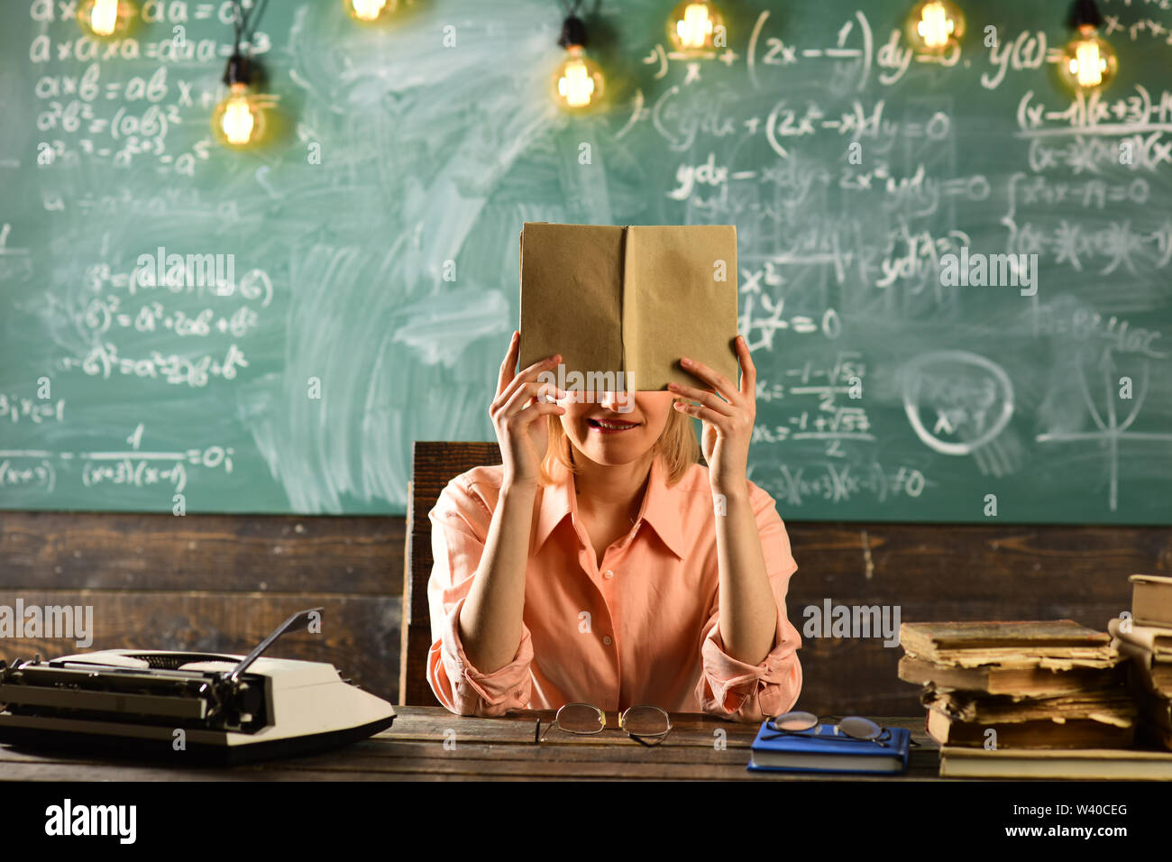 examination preparation of woman reading book. examination time at ...