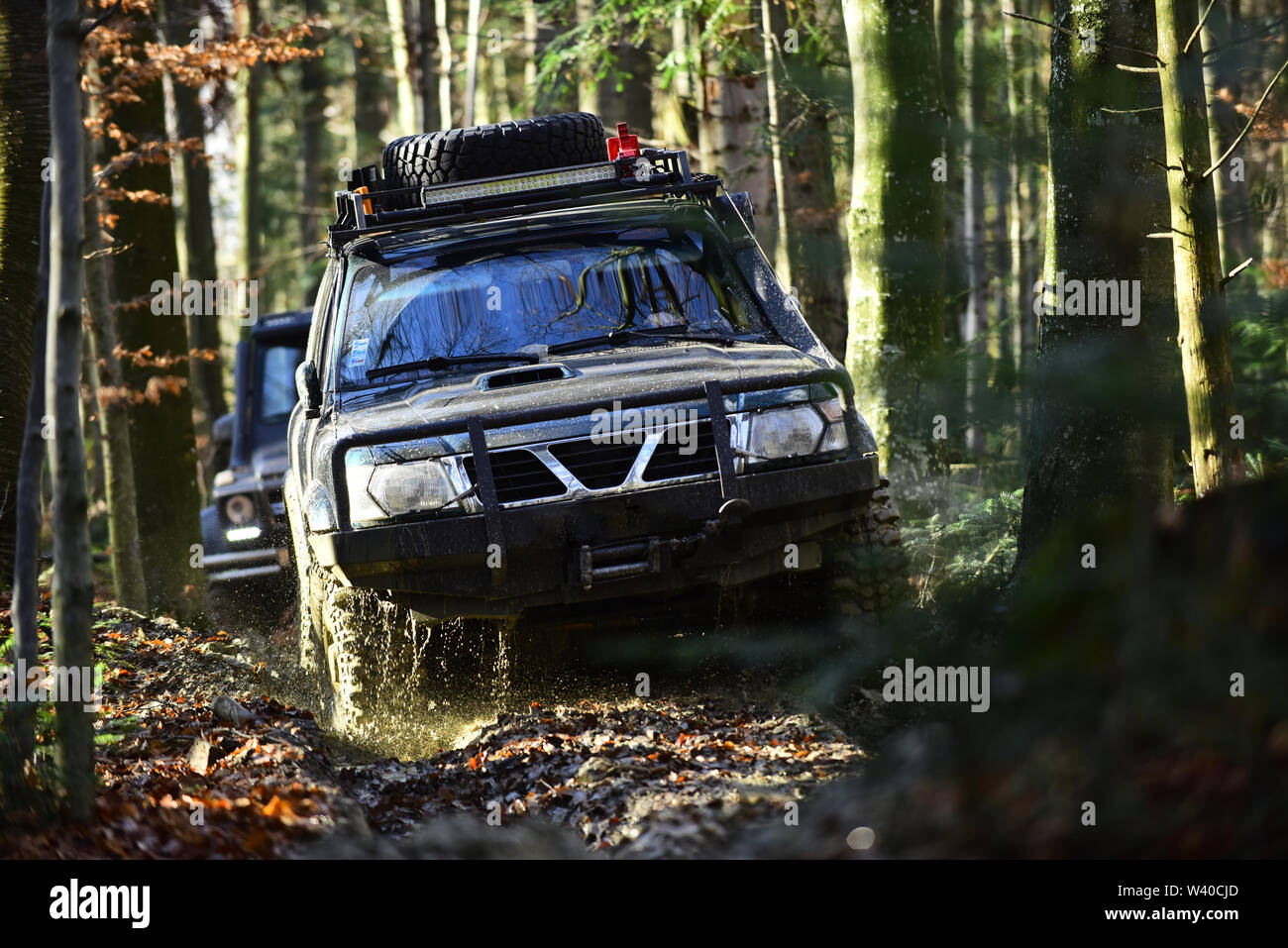 Offroad race on fall nature background. Rallying, competition and four ...