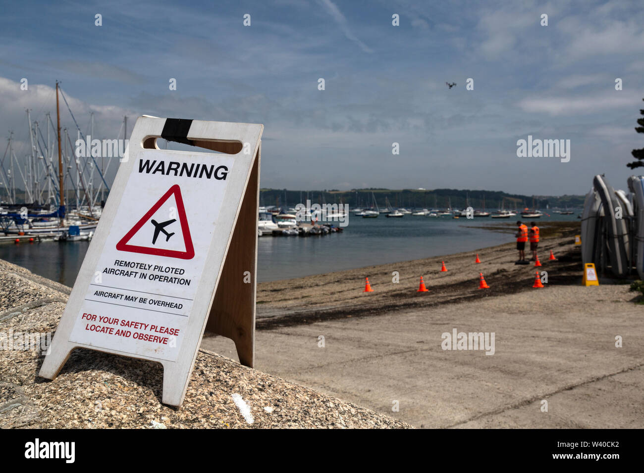 Warning sign, alerting people to the fact that a small drone is being ...