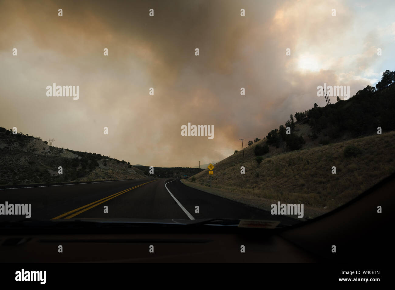 Forest fire burning in Southern Utah with smoke billowing over the ...